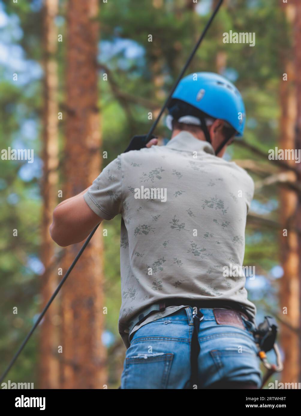 View of high ropes course, process of climbing in amusement acitivity ...