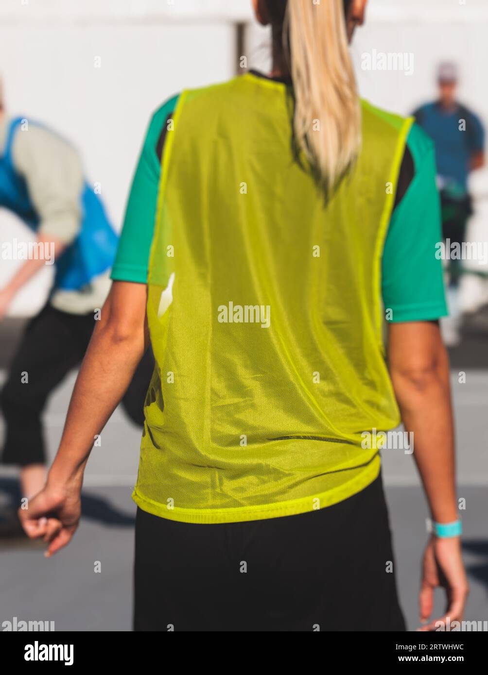 Female athletes play basketball, teenage team play street basketball ...