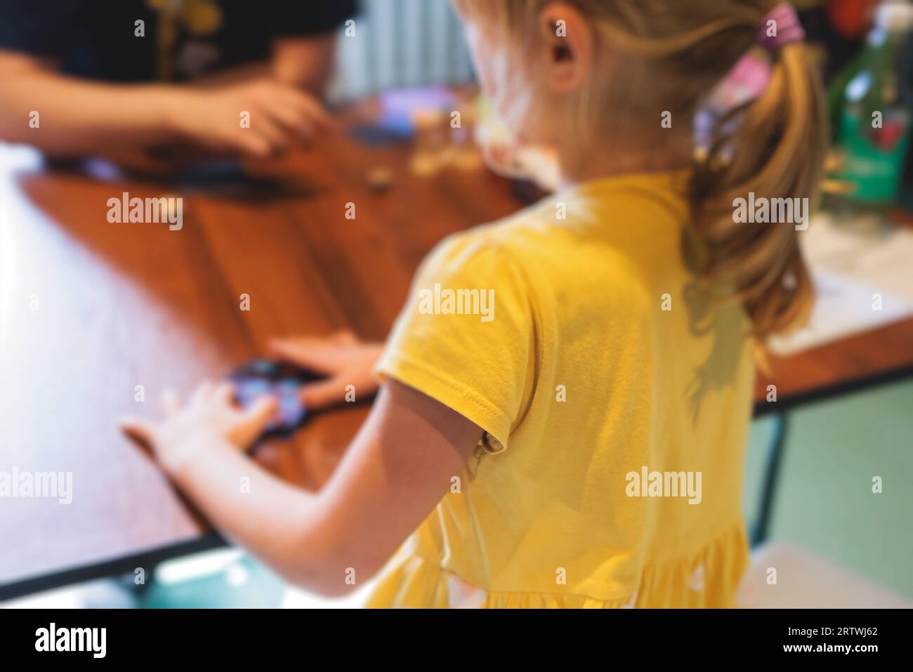 Process of playing board game and having fun with friends and family in ...