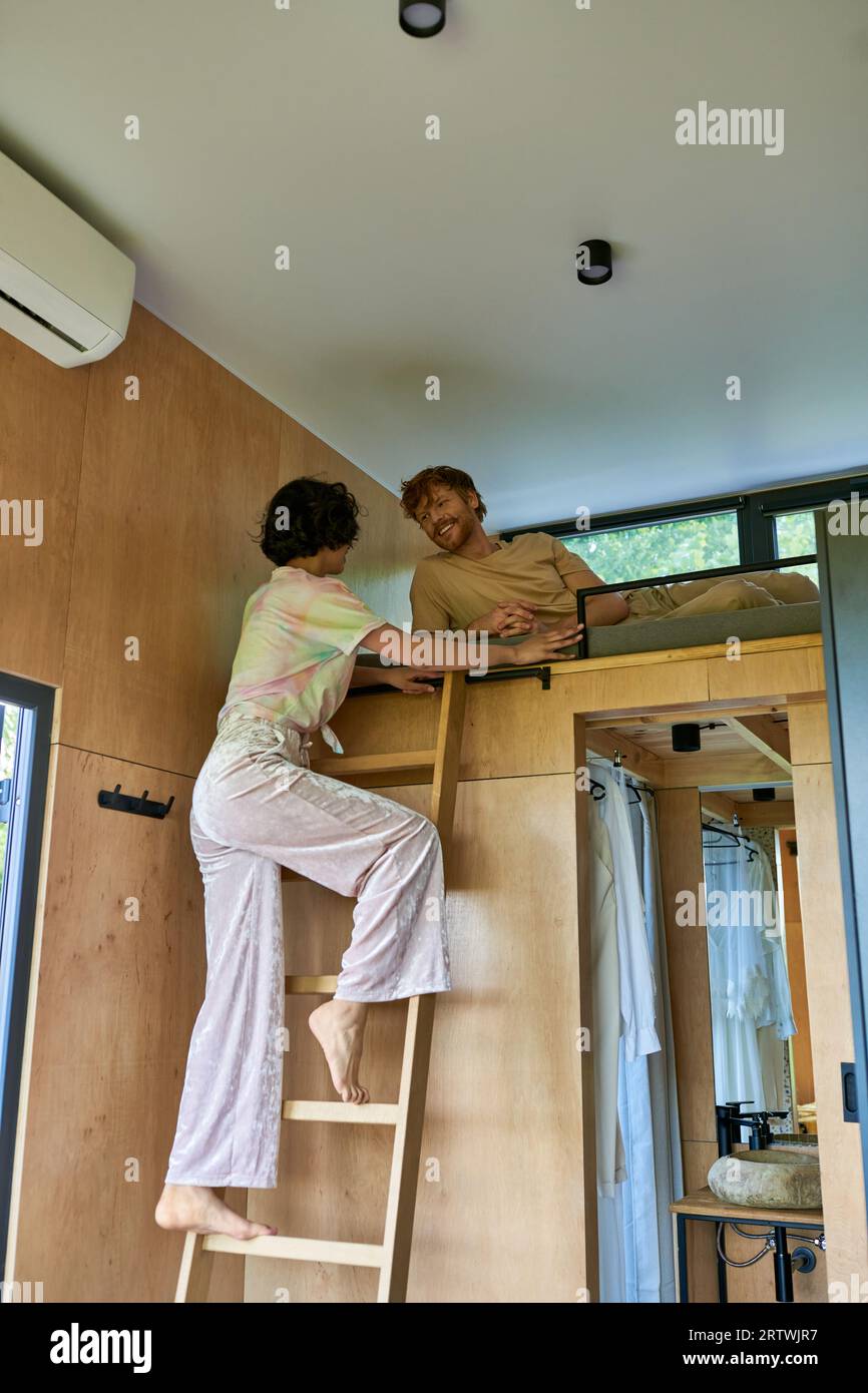 Man climbing into bed hi-res stock photography and images - Alamy