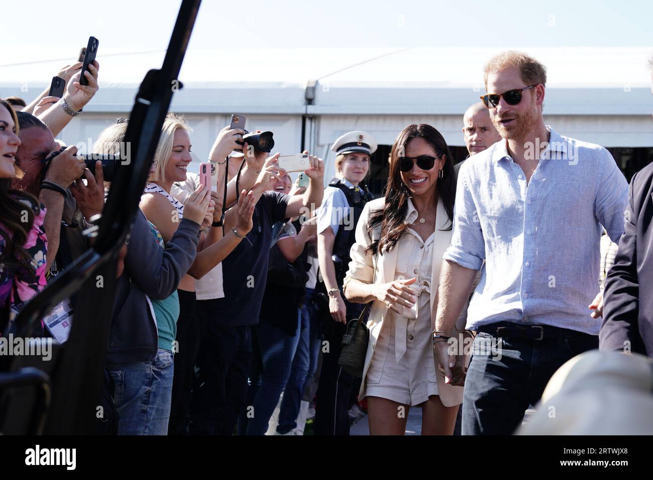 The Duke and Duchess of Sussex depart the archery event at the Merkur ...