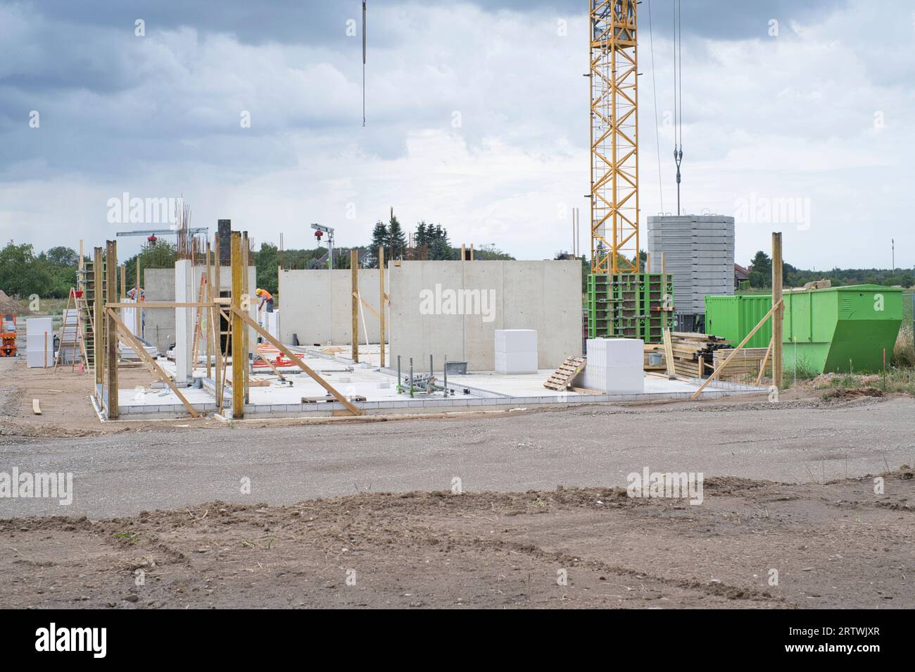 initial phase of a house construction, construction site with crane ...