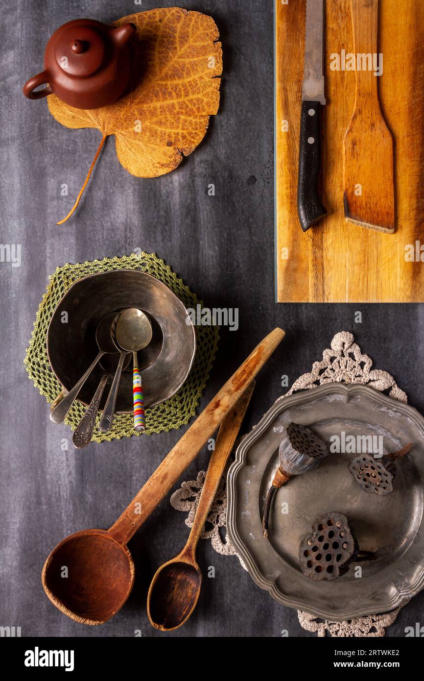Various antique objects on black chalkboard background. Flat lay. Top ...