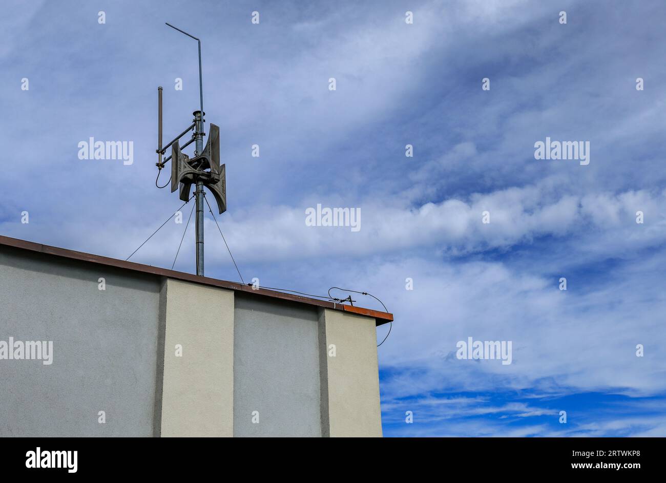 Warning alarm siren on the roof howl siren Stock Photo - Alamy