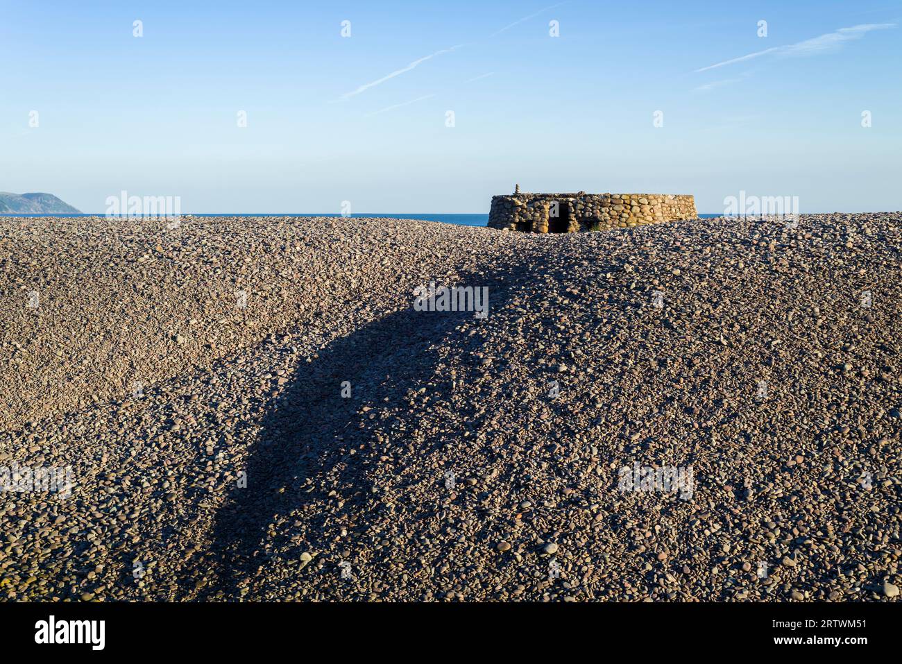 A World War Two pillbox on the pebble ridge at Bossington Beach in ...