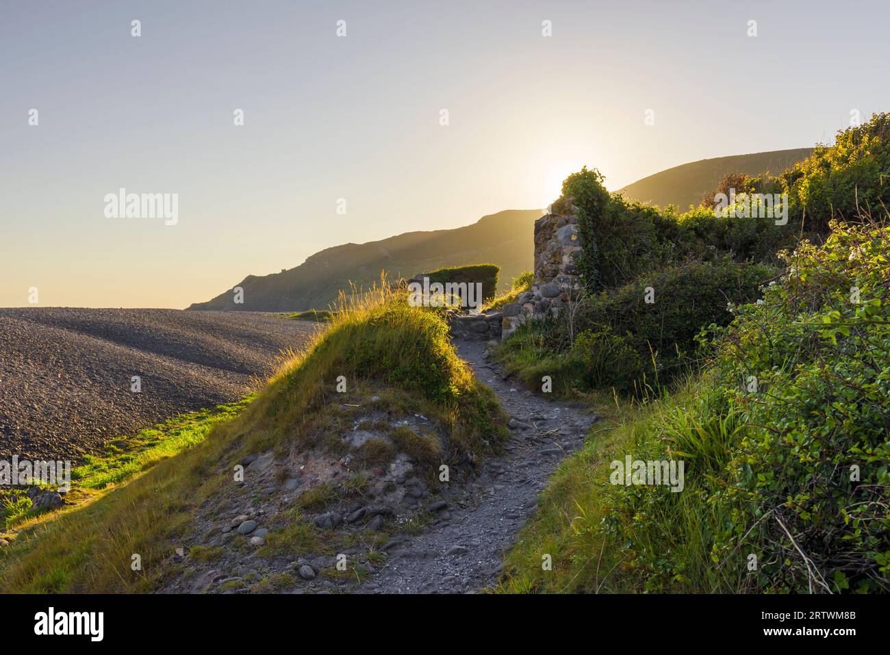 The old lime kiln next to the pebble ridge at Bossington Beach in ...