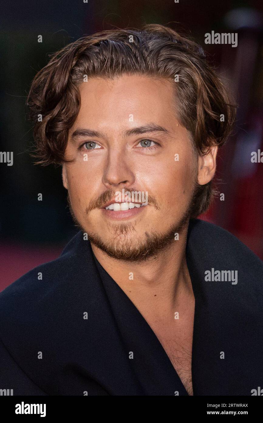 Cole Sprouse poses for photographers upon arrival at the Vogue World ...