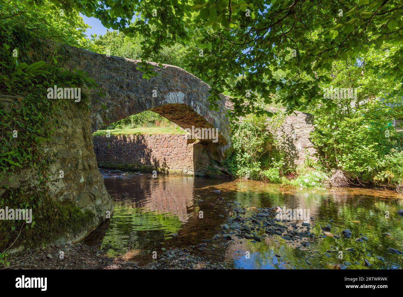 West Luccombe packhorse bridge over Horner Water in the Exmoor National ...