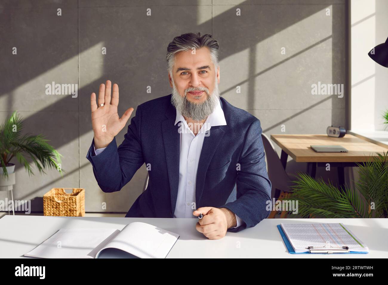 Happy senior bearded man waving hi-res stock photography and images - Alamy