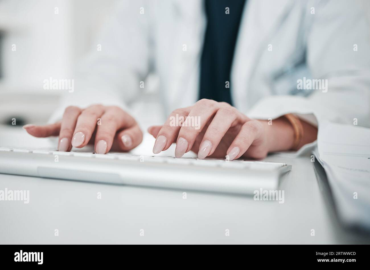 Keyboard, person hands and typing closeup with manicure, hospital and ...