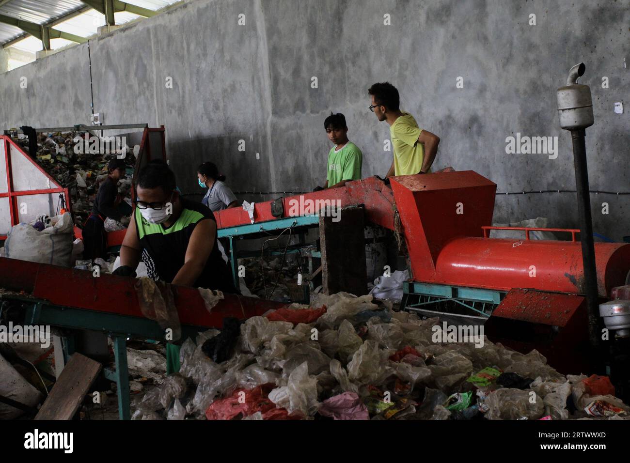 Sleman, Yogyakarta, Indonesia. 15th Sep, 2023. Workers sort waste at ...