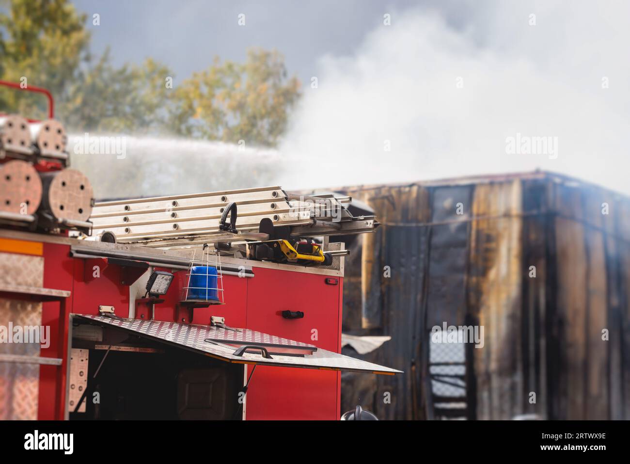 Fire fighting equipment in the city, with red fire engine truck during ...