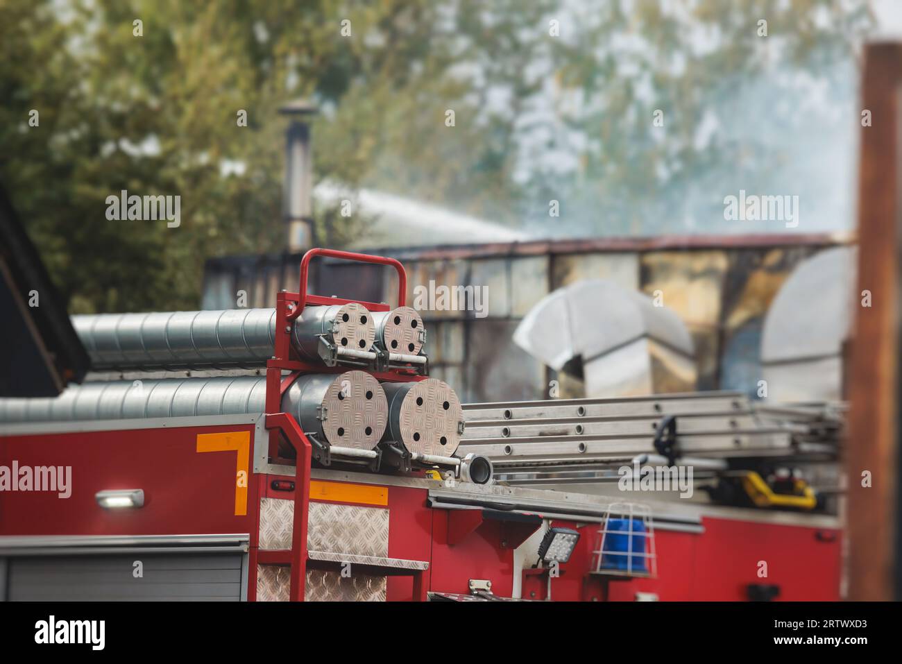 Fire fighting equipment in the city, with red fire engine truck during ...