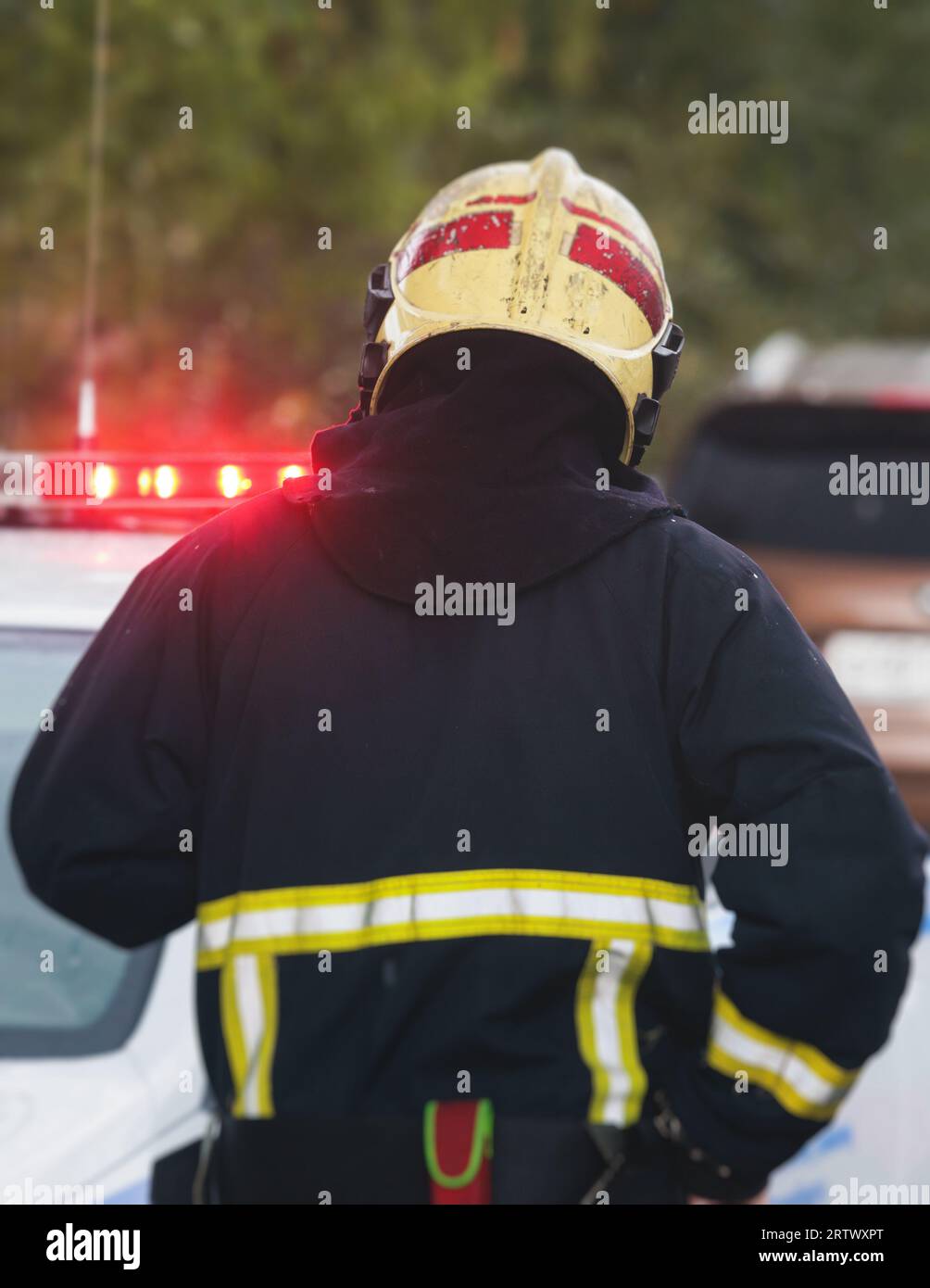 Group of fire men in protective uniform during fire fighting operation ...