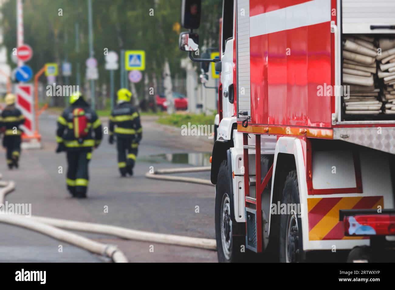 Fire fighting equipment in the city, with red fire engine truck during ...