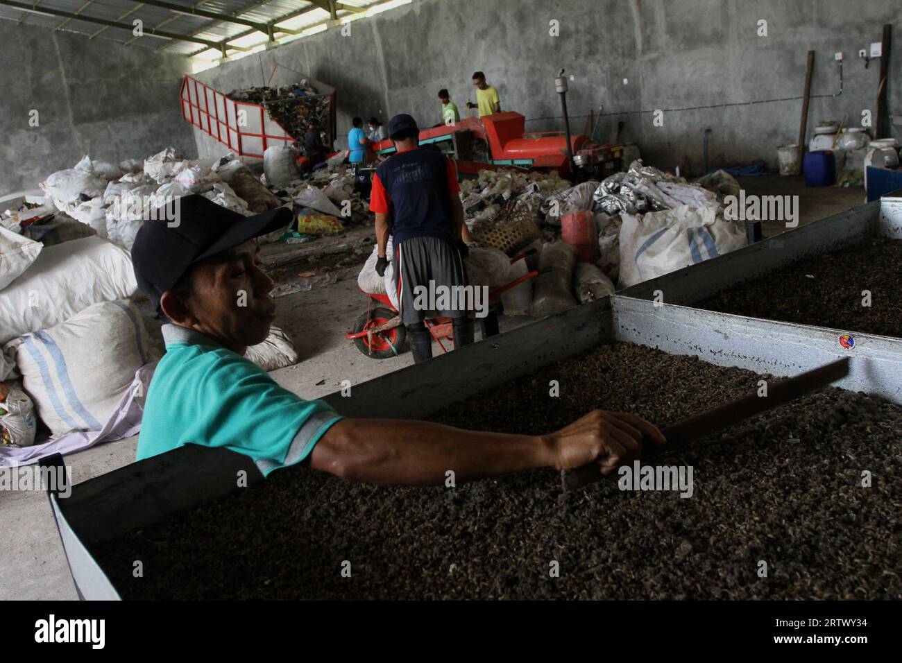 Sleman, Yogyakarta, Indonesia. 15th Sep, 2023. Workers sort waste at ...