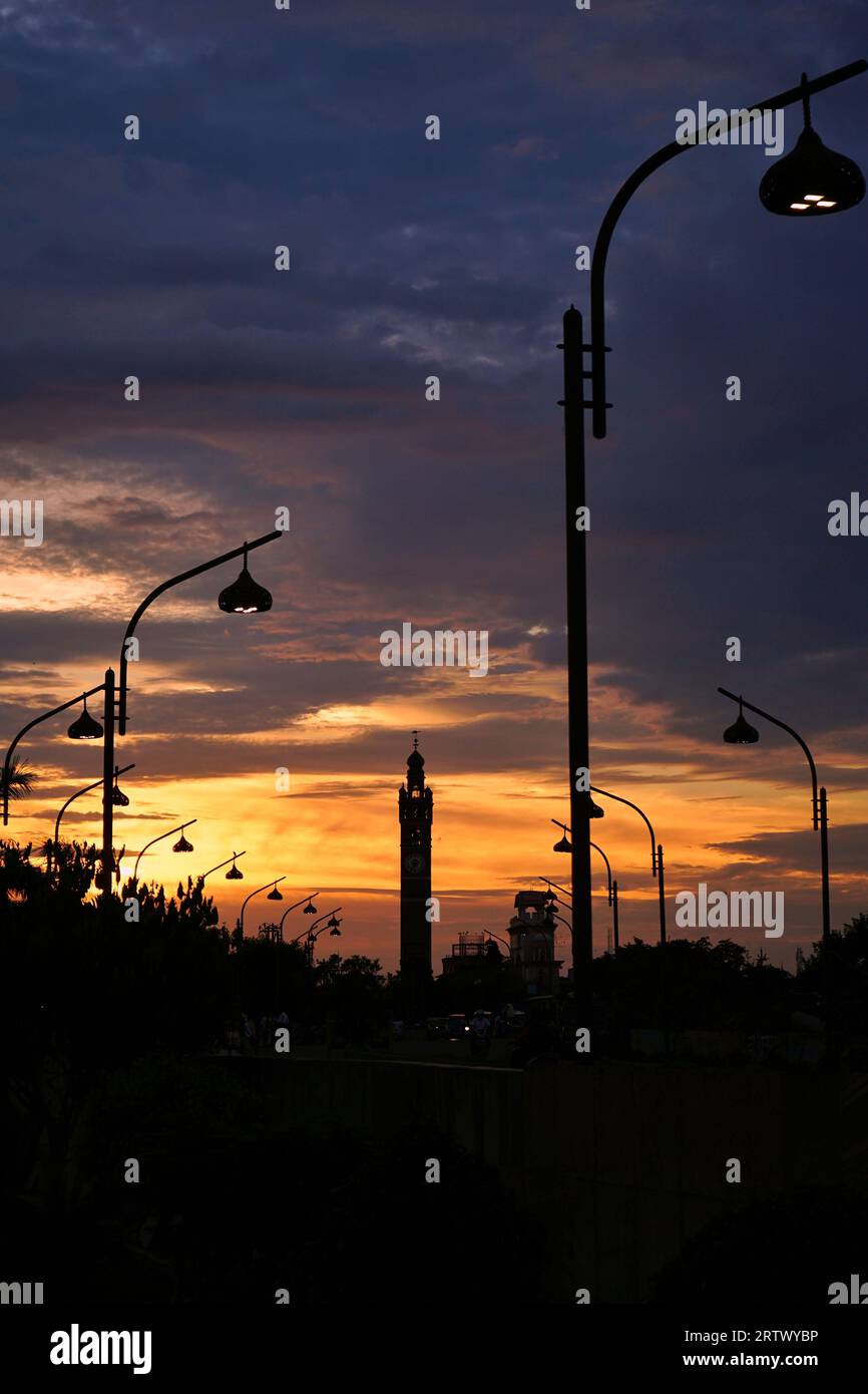 Sunset stories and clock tower Stock Photo - Alamy