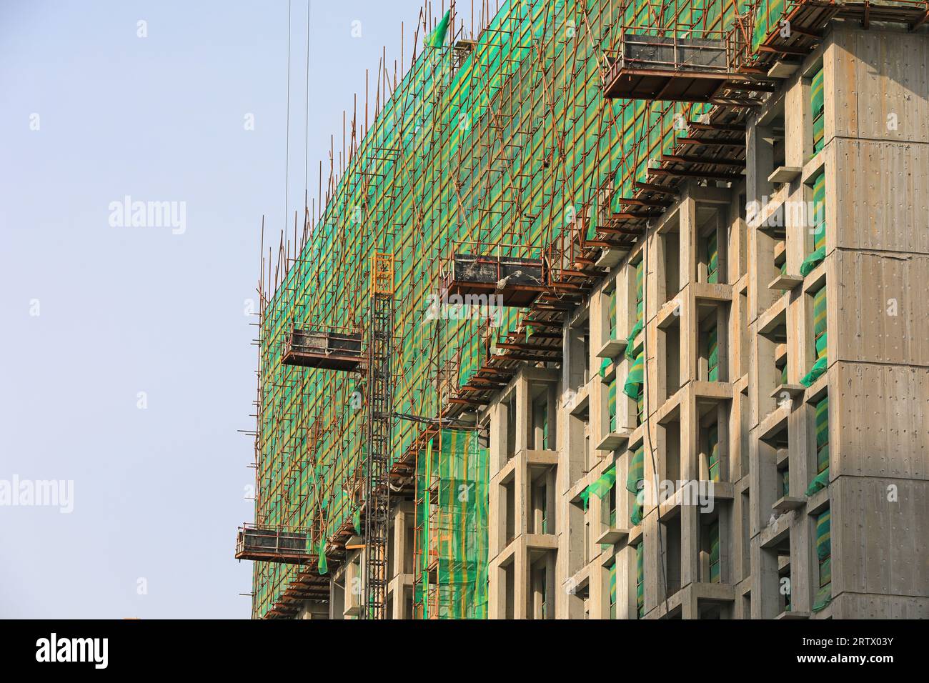 Unfinished buildings are in a city, North China Stock Photo - Alamy