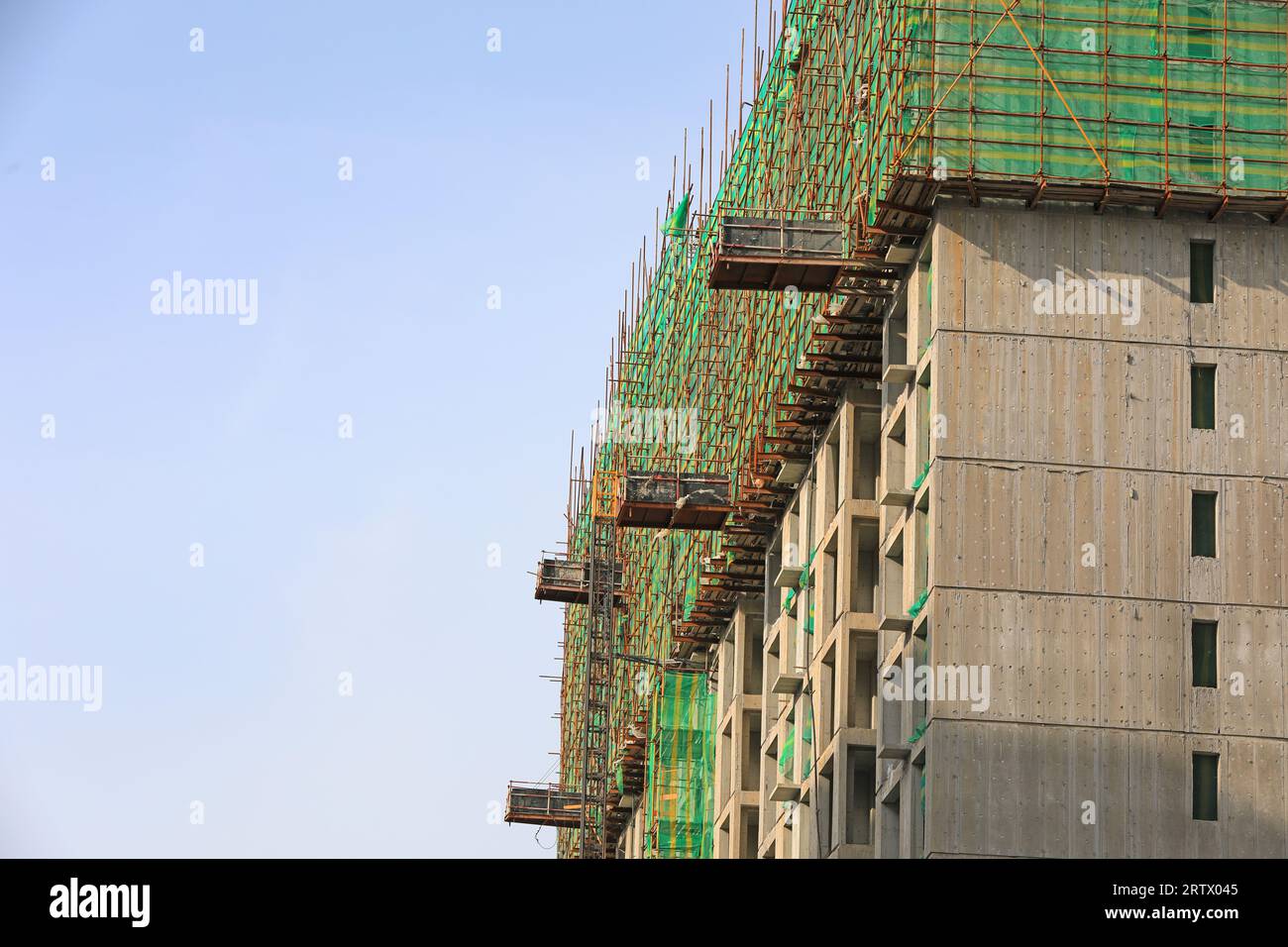 Unfinished buildings are in a city, North China Stock Photo - Alamy