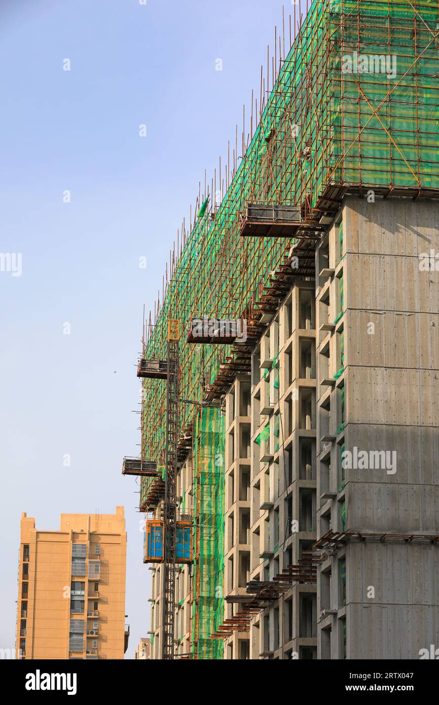 Unfinished buildings are in a city, North China Stock Photo - Alamy