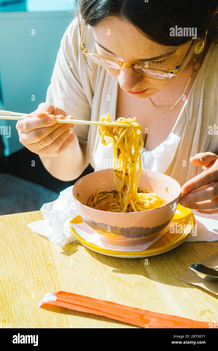 Woman eating soup that is too hot hi-res stock photography and images ...