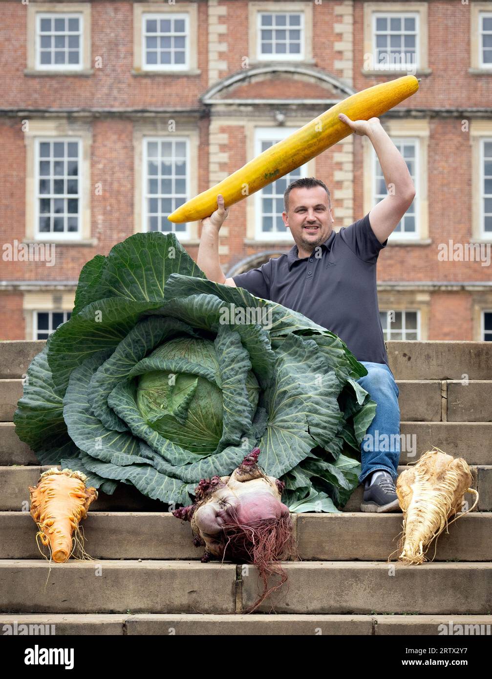Paul Proud with with his winning giant cabbage, parsnip, carrot ...