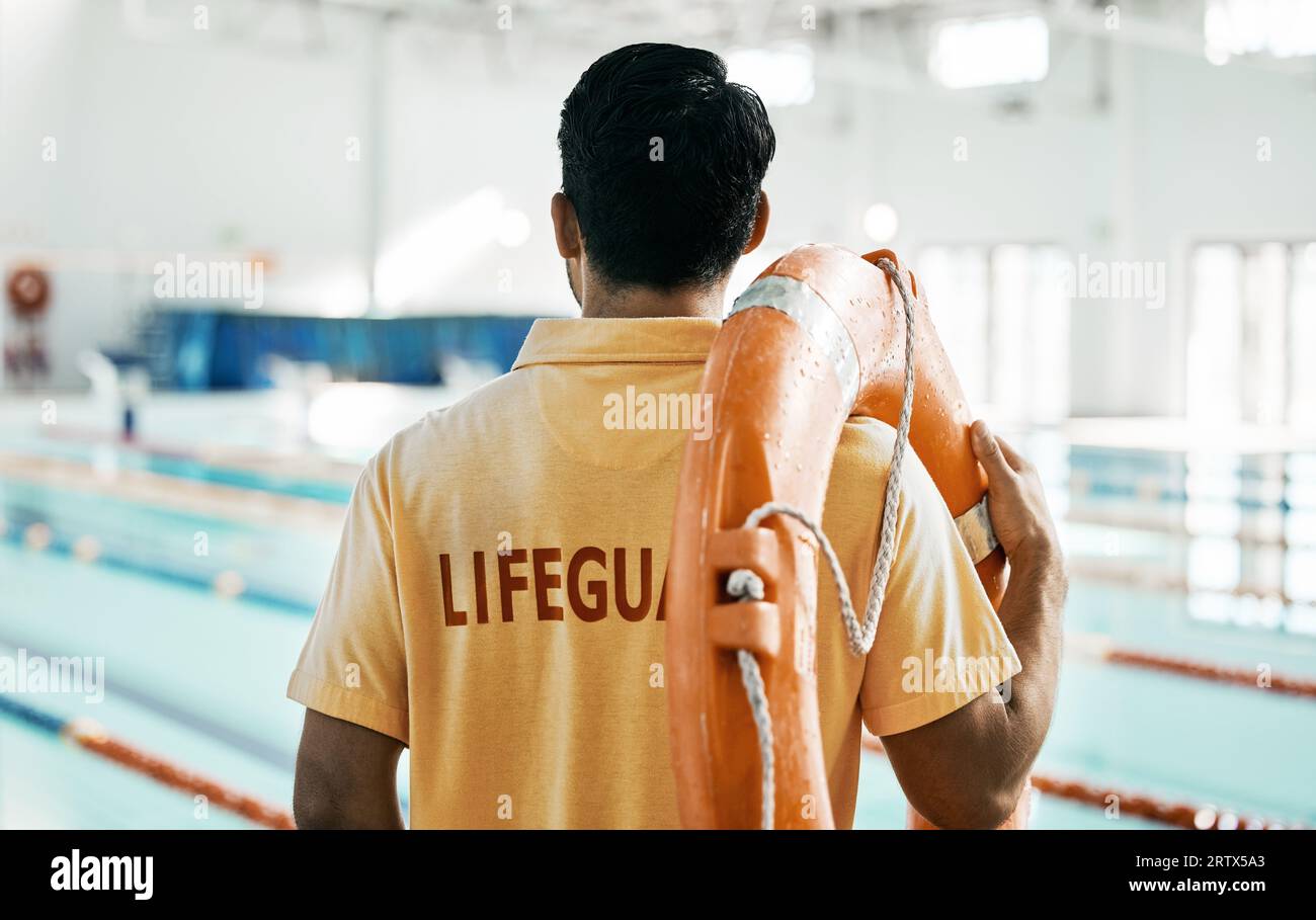 Lifeguard, back and person with swimming, pool or safety lifebuoy for ...