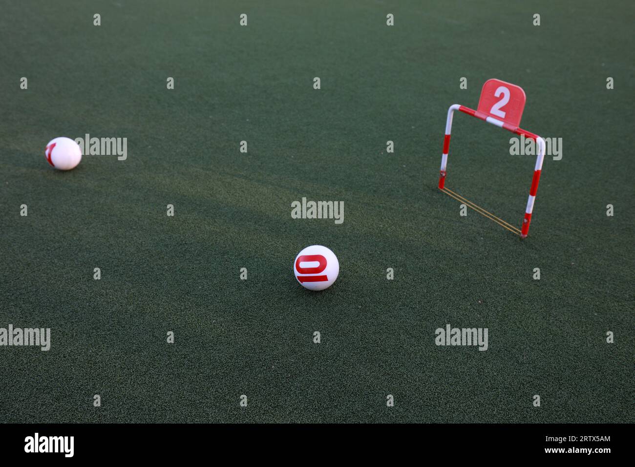 Chinese gateball on artificial lawn Stock Photo - Alamy