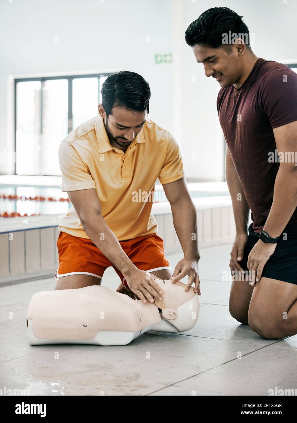 Swimming pool safety, CPR and people learning, coaching or life saving ...