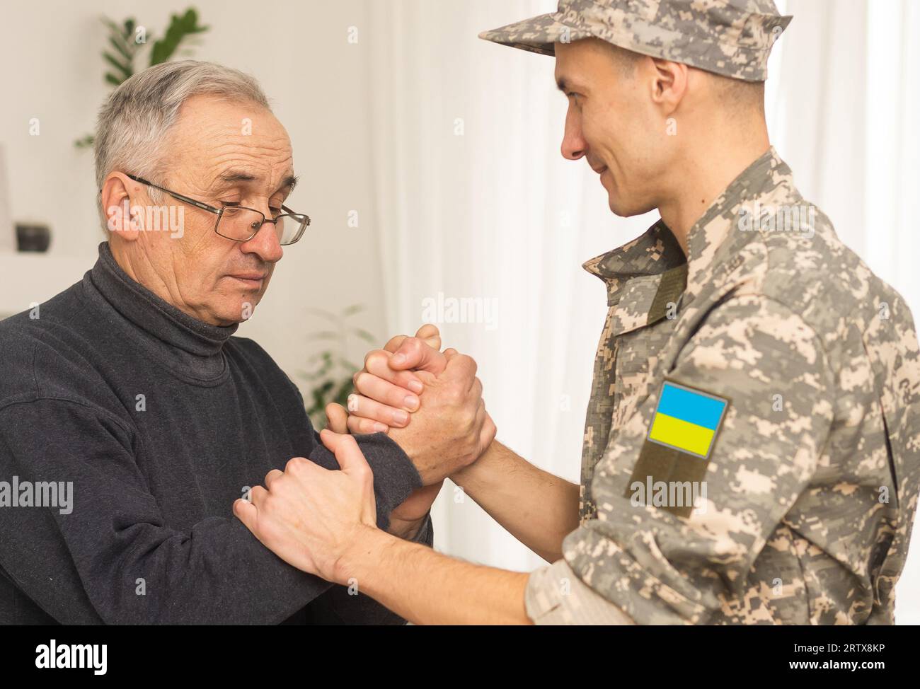Ukrainian military man with his father Stock Photo - Alamy