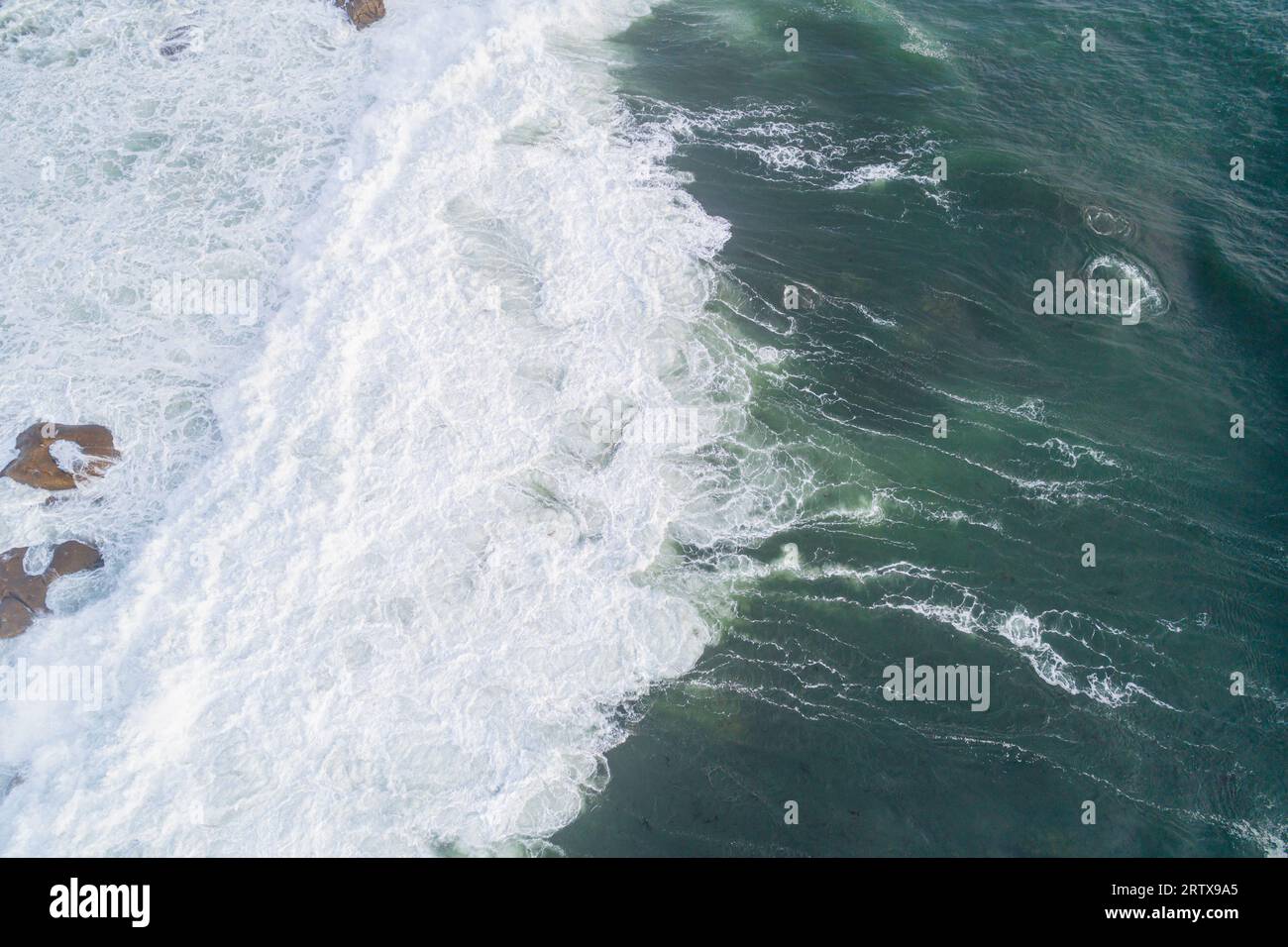 Waves creating sea foam hi-res stock photography and images - Alamy