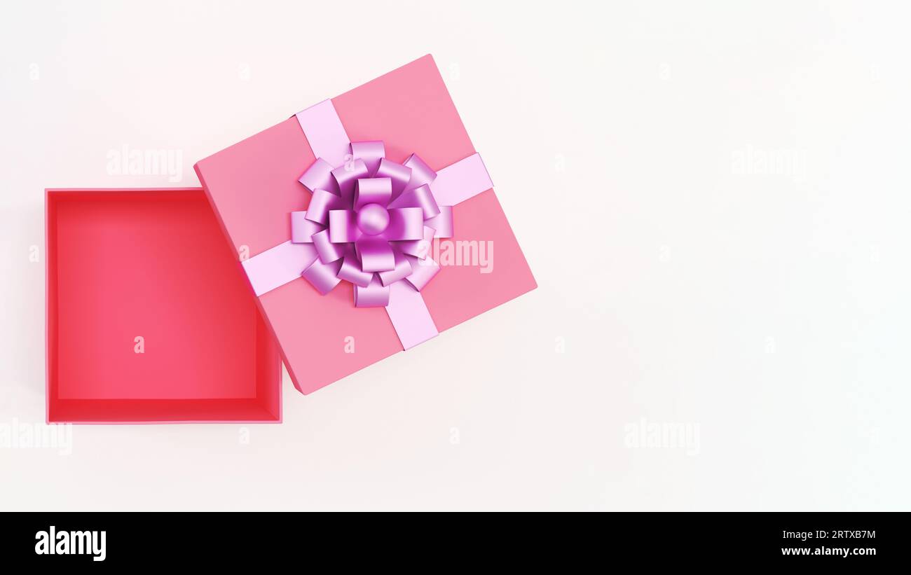 Top view of open pink gift box with pink ribbon bow isolated on white ...