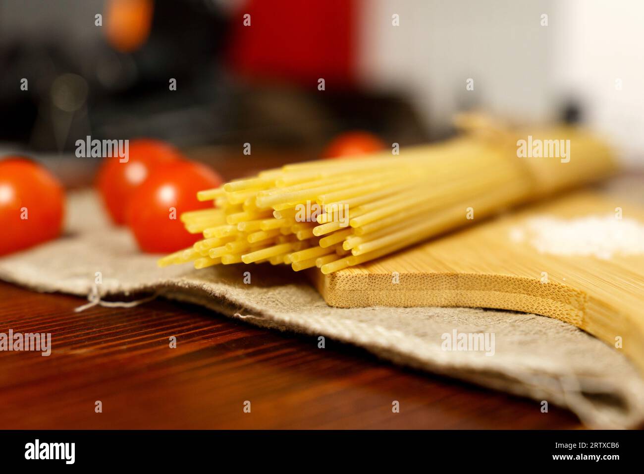 Italian raw spaghetti, ready to cook. Italian cuisine or culinary ...