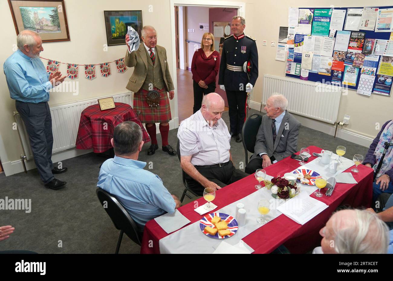 Britain's King Charles III unveils a plaque during a visit to Kinross ...