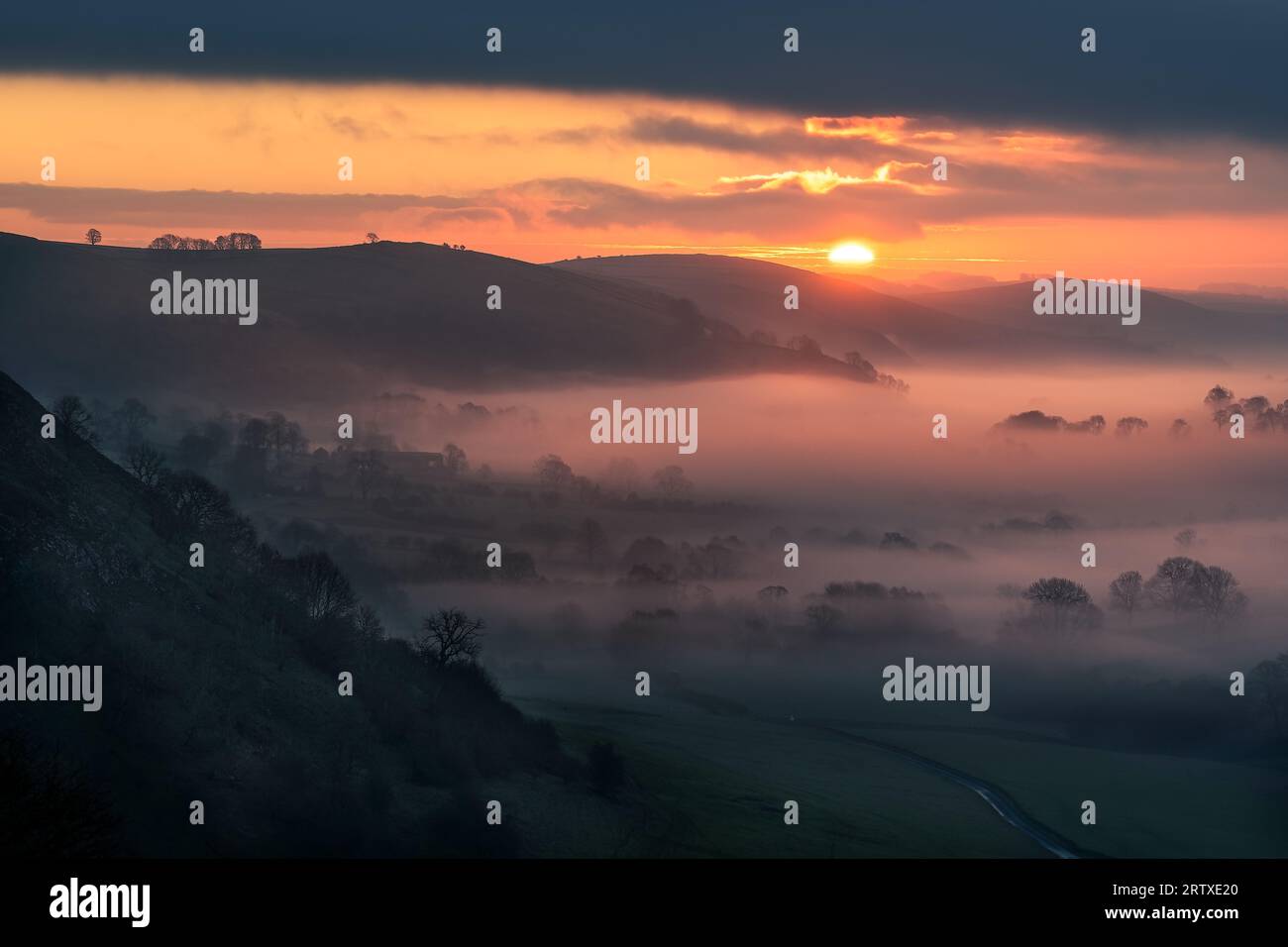 Cloud Inversion at Sunrise overlooking hills and valley Stock Photo - Alamy