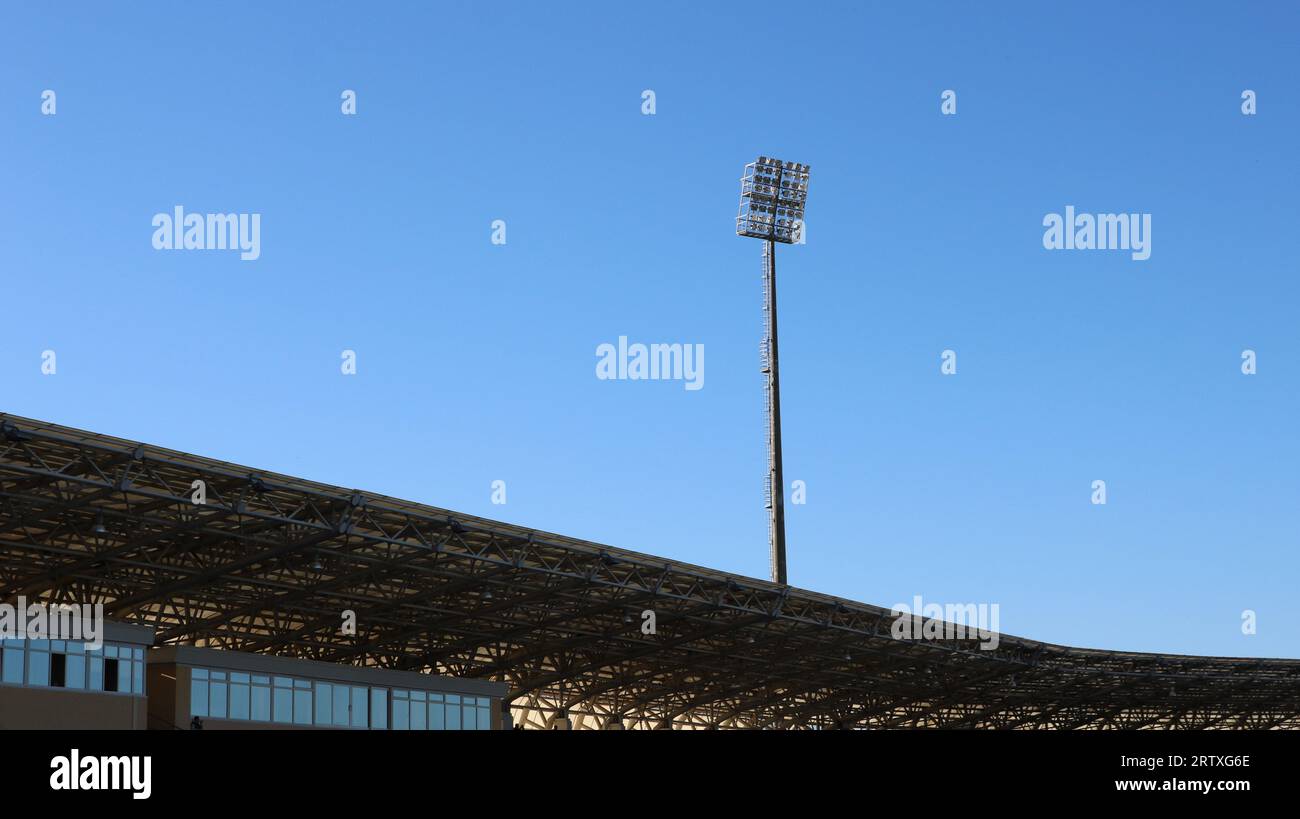 fragment of a stadium with part of the roof, covered spectator stands ...