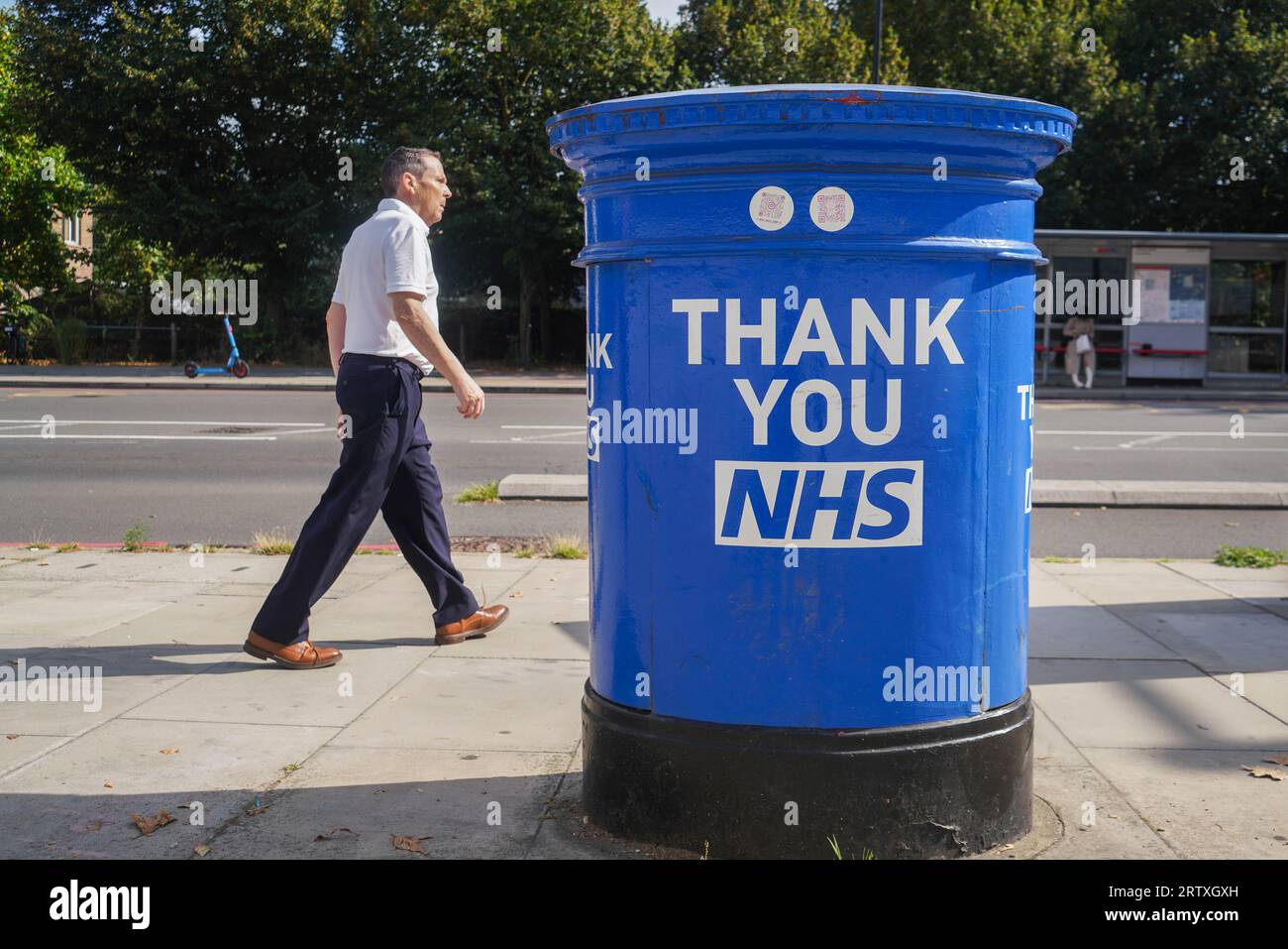 London UK. 15 September 2023 . A pedestrian walks past a thankful ...