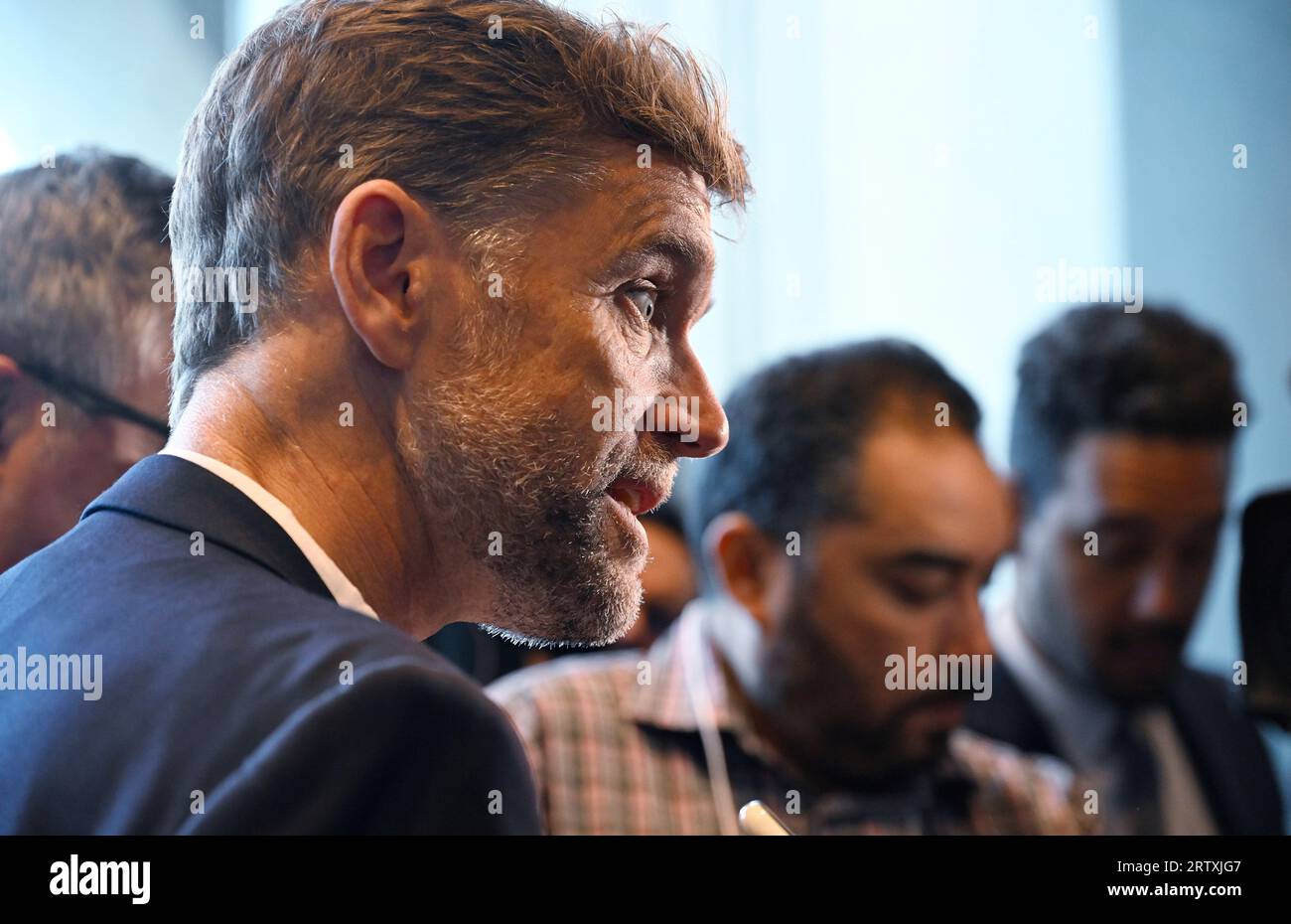 Quebec City mayor Bruno Marchand responds to reporters questions as he ...