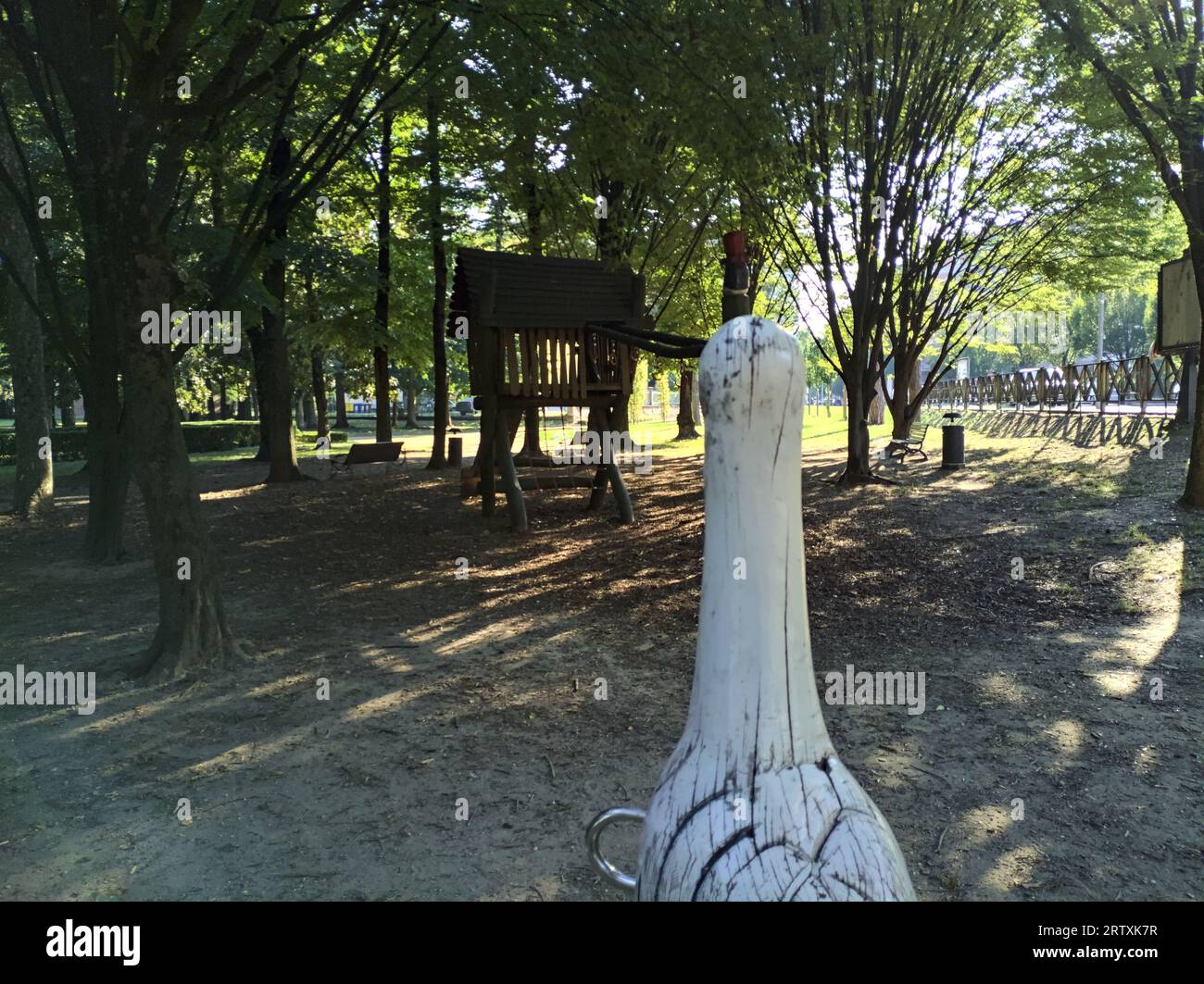 Swing in a playground summer a swing hanging seat hi-res stock ...