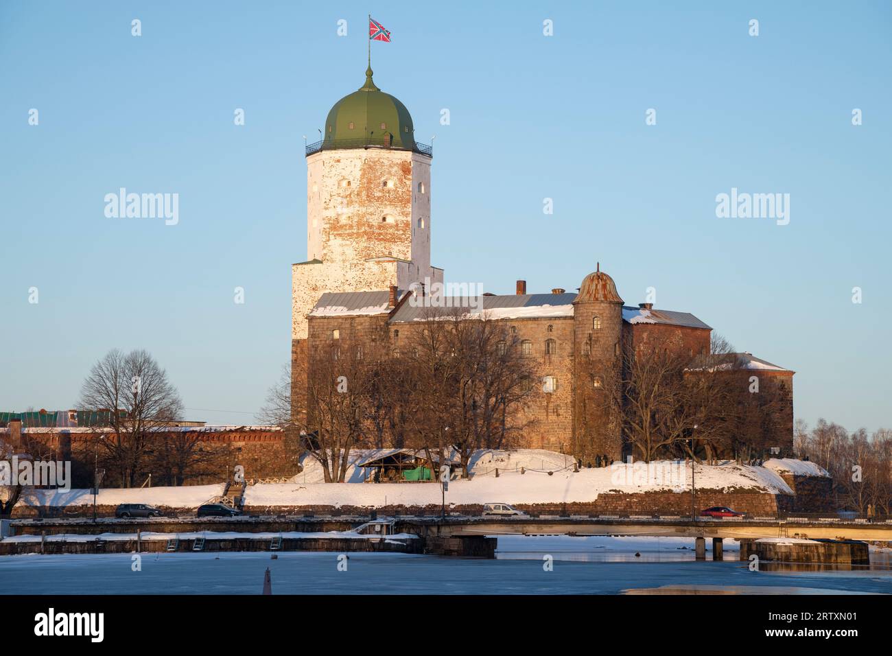 Ancient Vyborg castle on a sunny January evening. Leningrad region ...