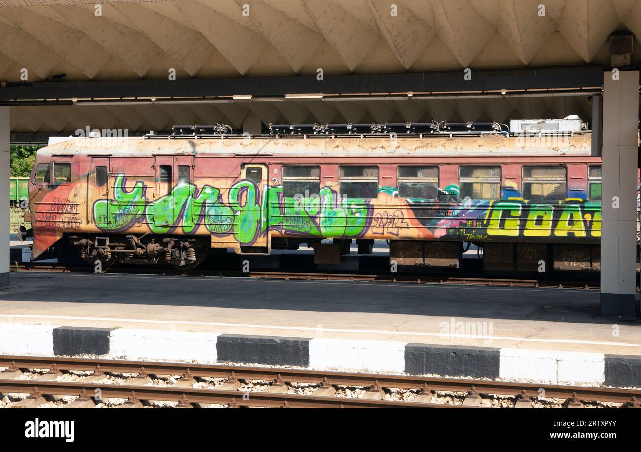 A retired electric locomotive with artistic graffiti. Bulgaria Stock ...