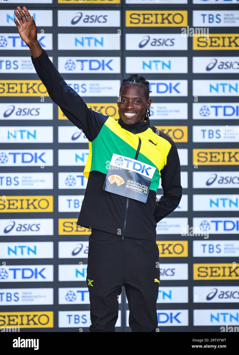 Wayne Pinnock of Jamaica with his silver medal for long jump on day ...