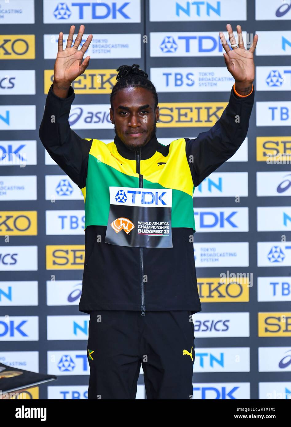 Wayne Pinnock of Jamaica with his silver medal for long jump on day ...