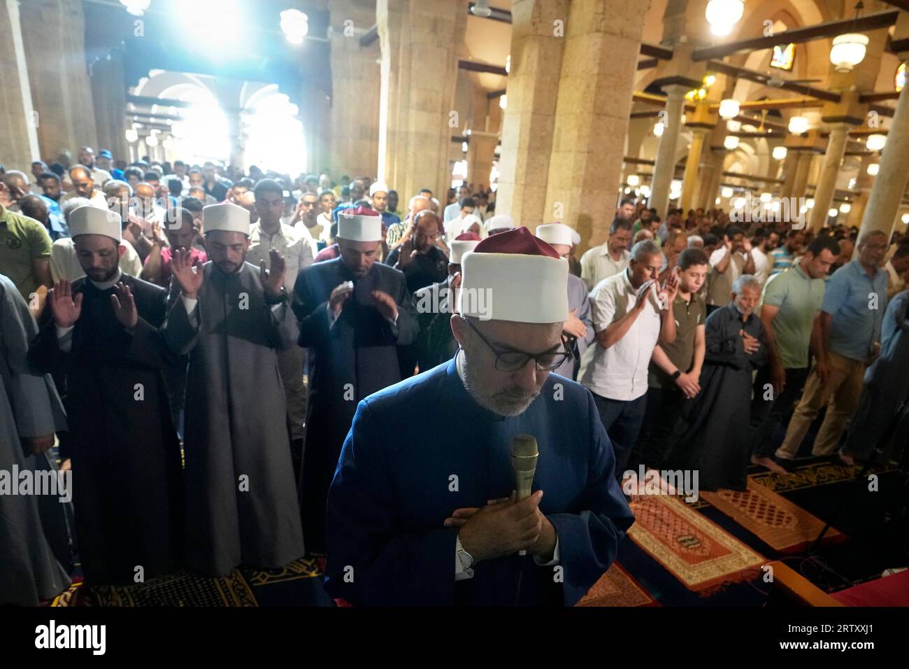 Sheikh Nazir Ayyad leads the absent prayers for the victims of flooding ...