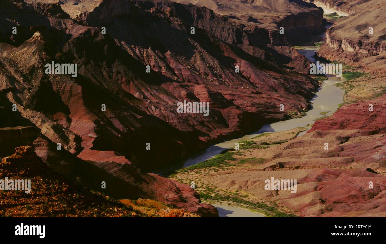 Colorado River meanders through Grand Canyon with sandstone drenched ...