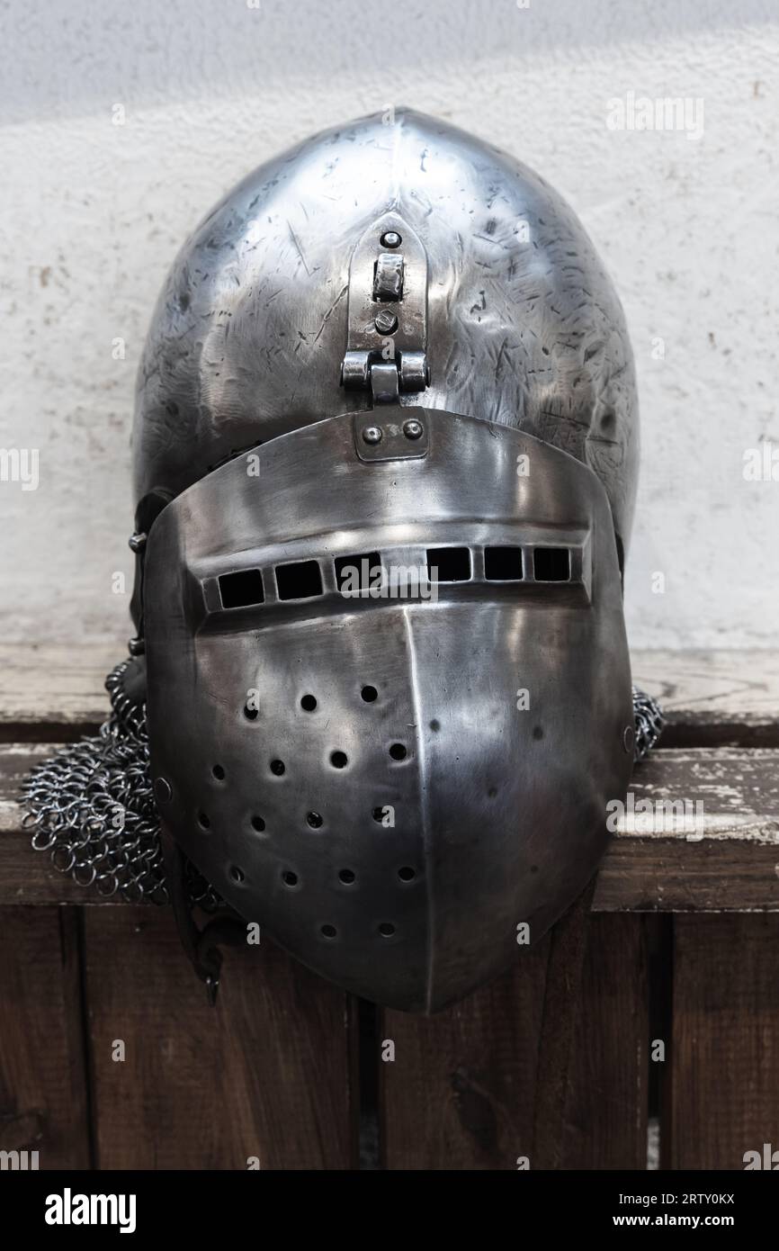 Medieval knight closed iron helmet close up photo with selective soft ...
