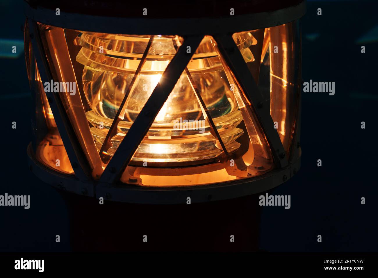 Lighthouse lamp in metal frame mounted on a top of a beacon Stock Photo ...