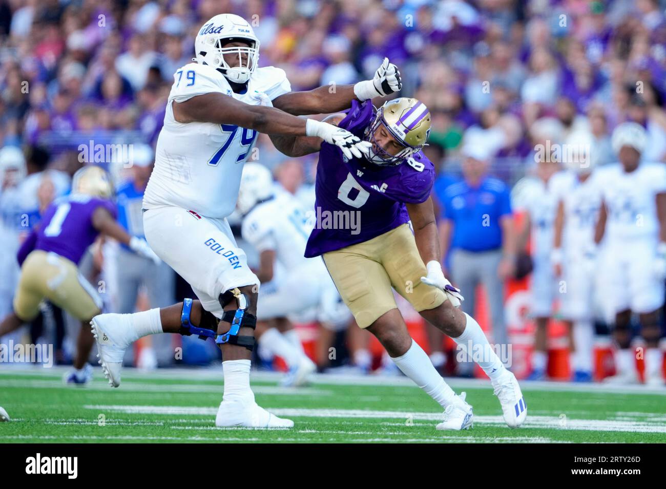 Washington edge Bralen Trice in action against Tulsa offensive lineman ...