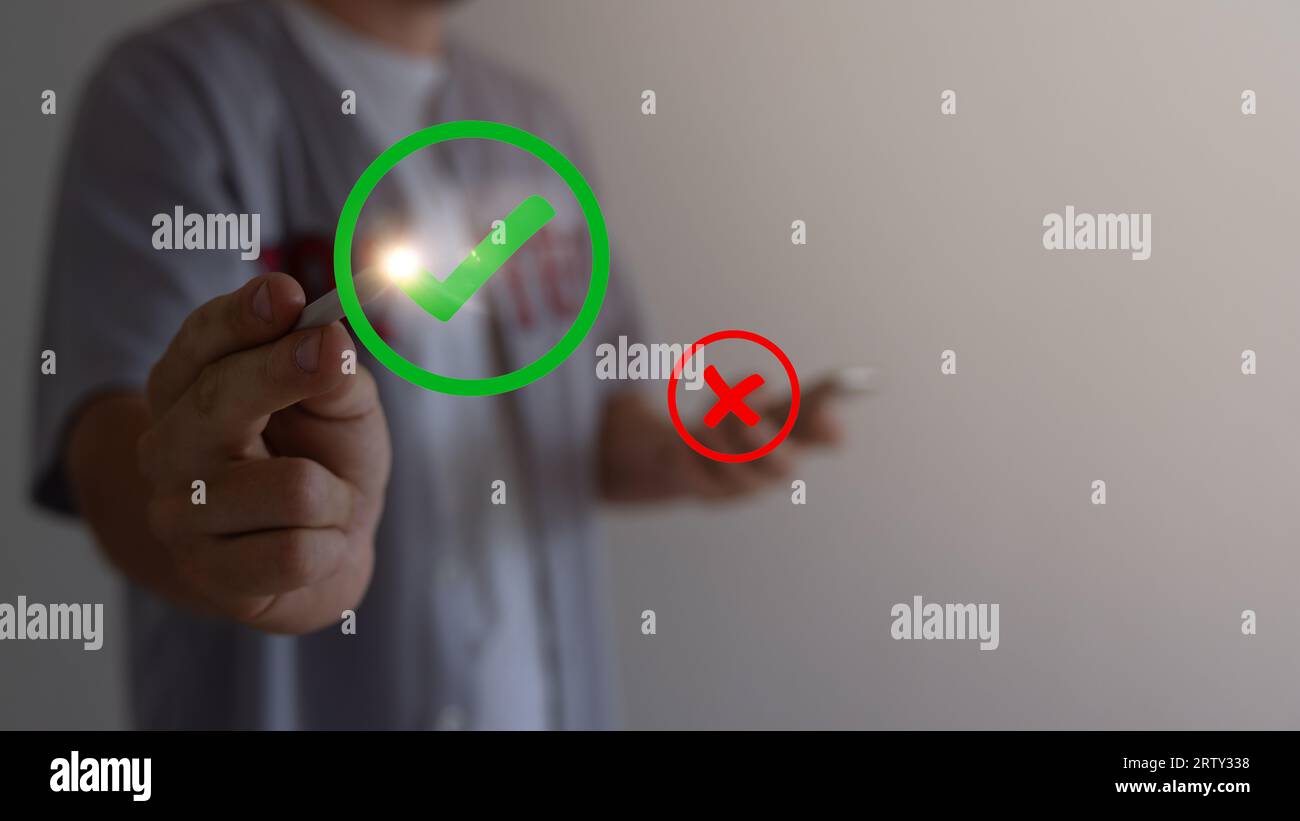 Right, and wrong icons with men's hand choosing the right icon ...