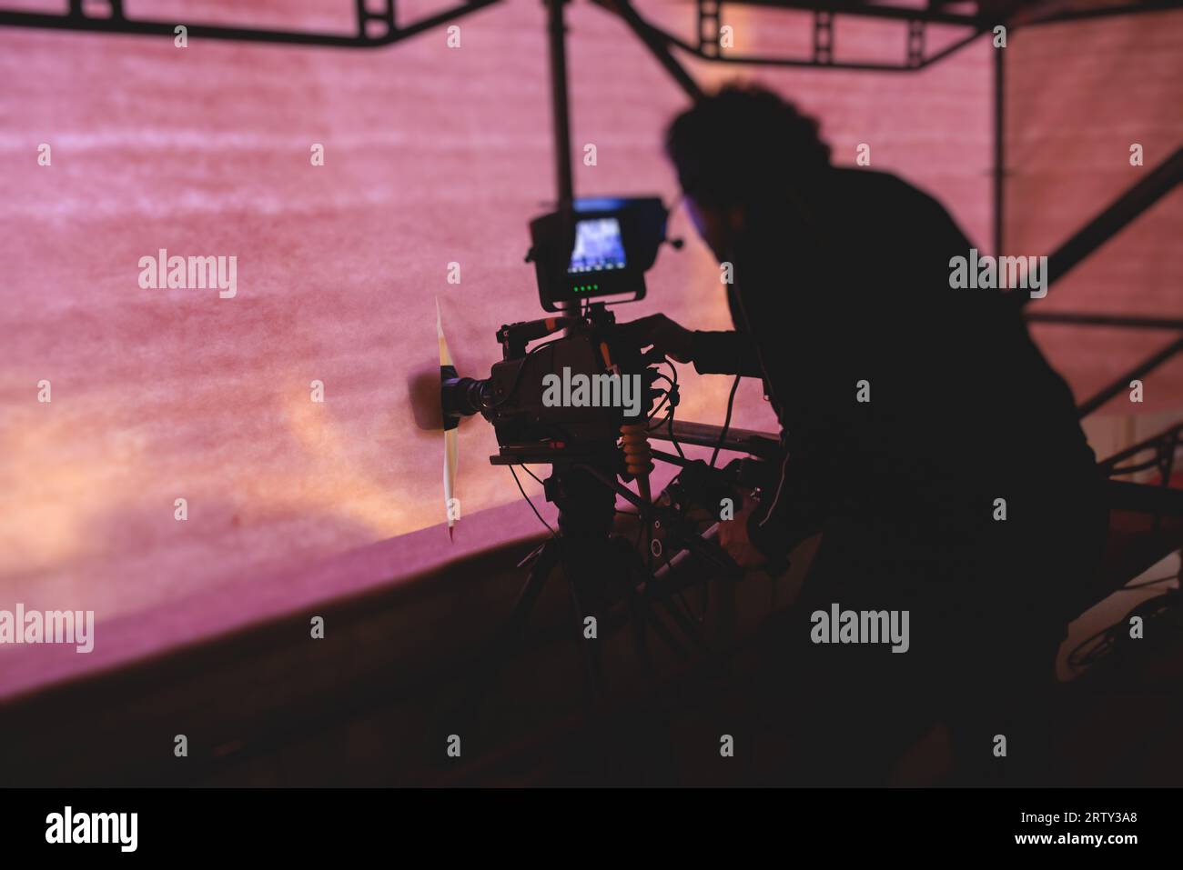 View of a camera man operator working during tv reportage, online ...